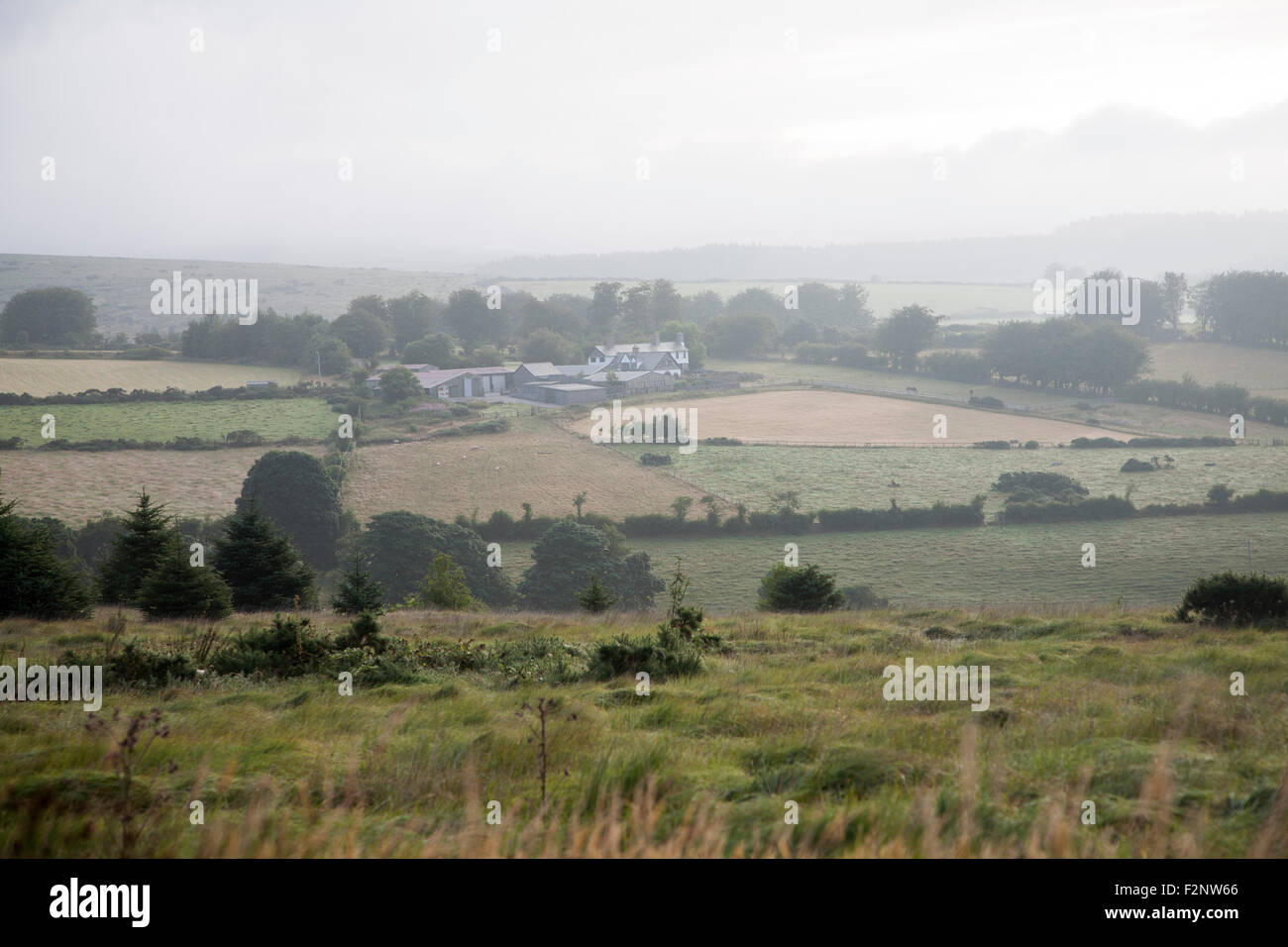 Grey overcast weather clouds hanging over moorland, Dartmoor national ...