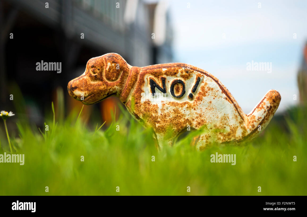No dog mess notice sculpture Stock Photo - Alamy