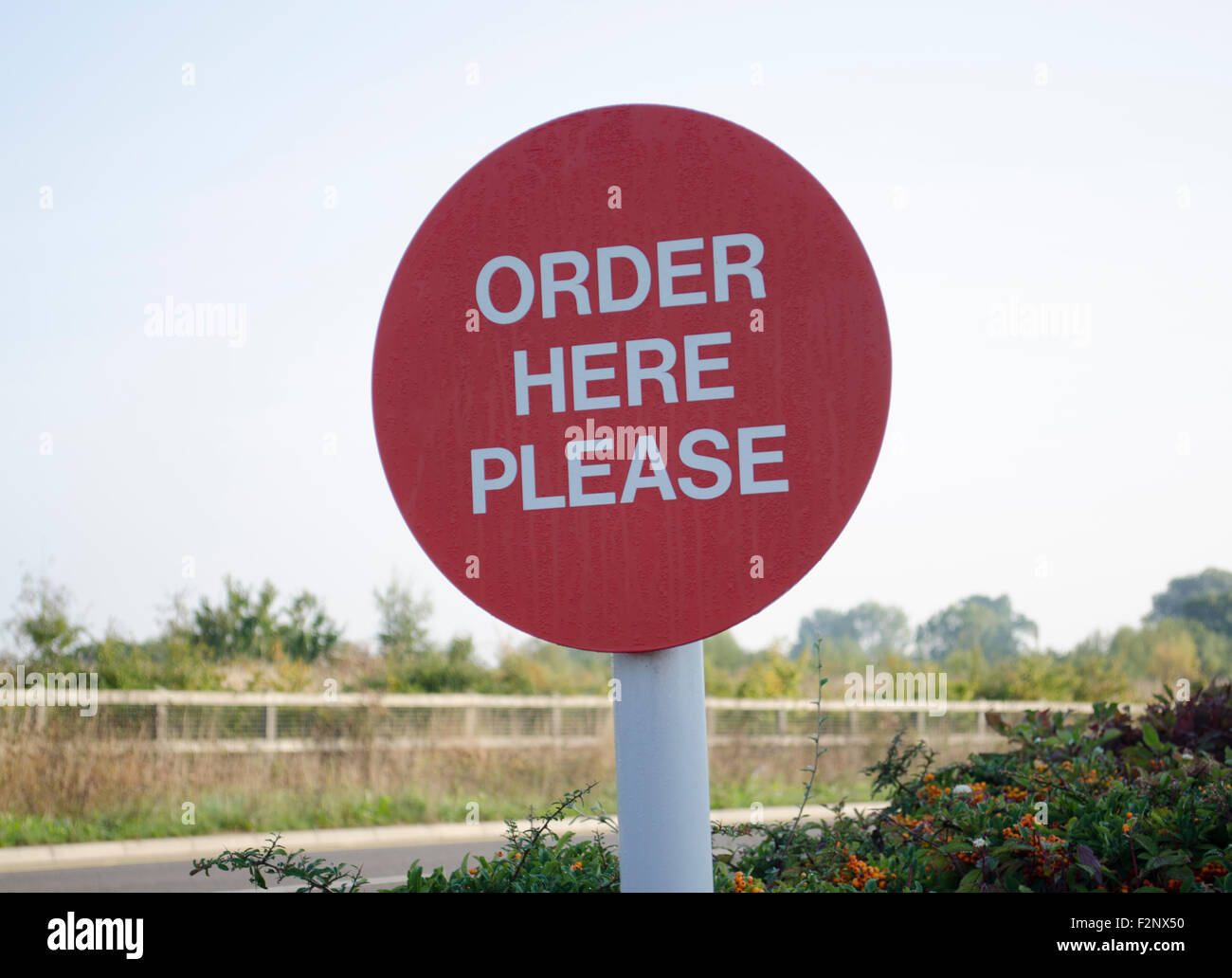 Order here sign in red, UK Stock Photo - Alamy