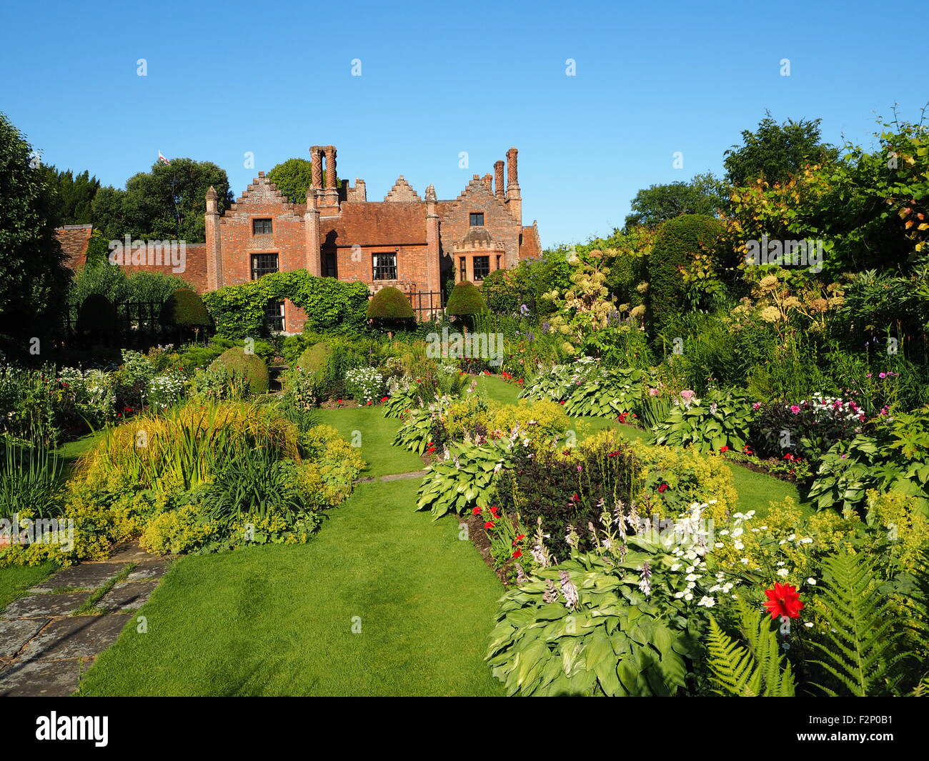 Chenies Manor House and sunken garden with beautiful perennial flower ...