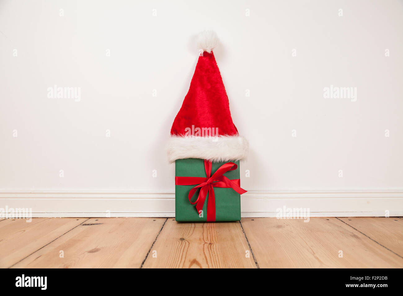 single christmas present with cap Stock Photo - Alamy
