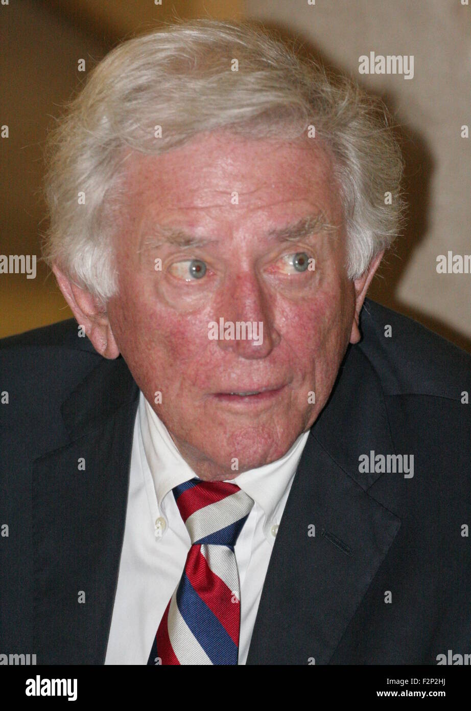 Former American senator and author Gary Hart signs copies of his book ...