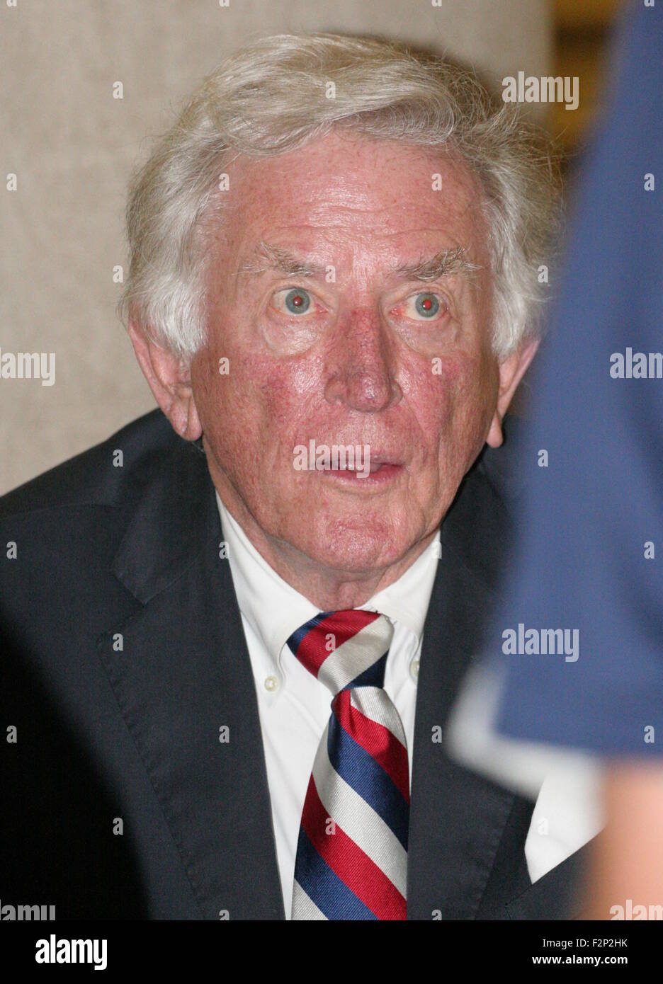 Former American senator and author Gary Hart signs copies of his book ...