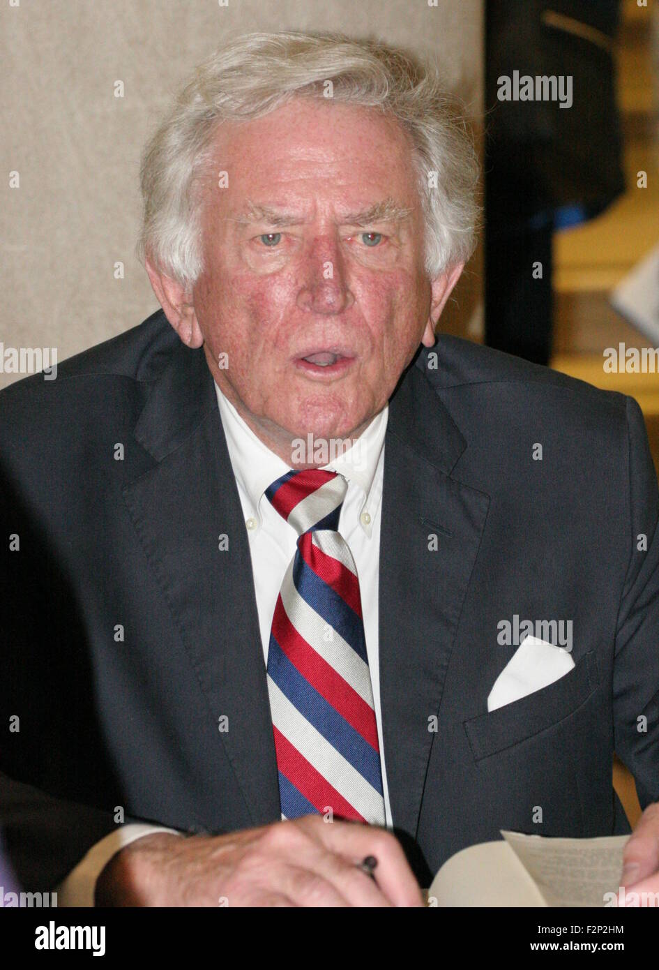 Former American senator and author Gary Hart signs copies of his book ...