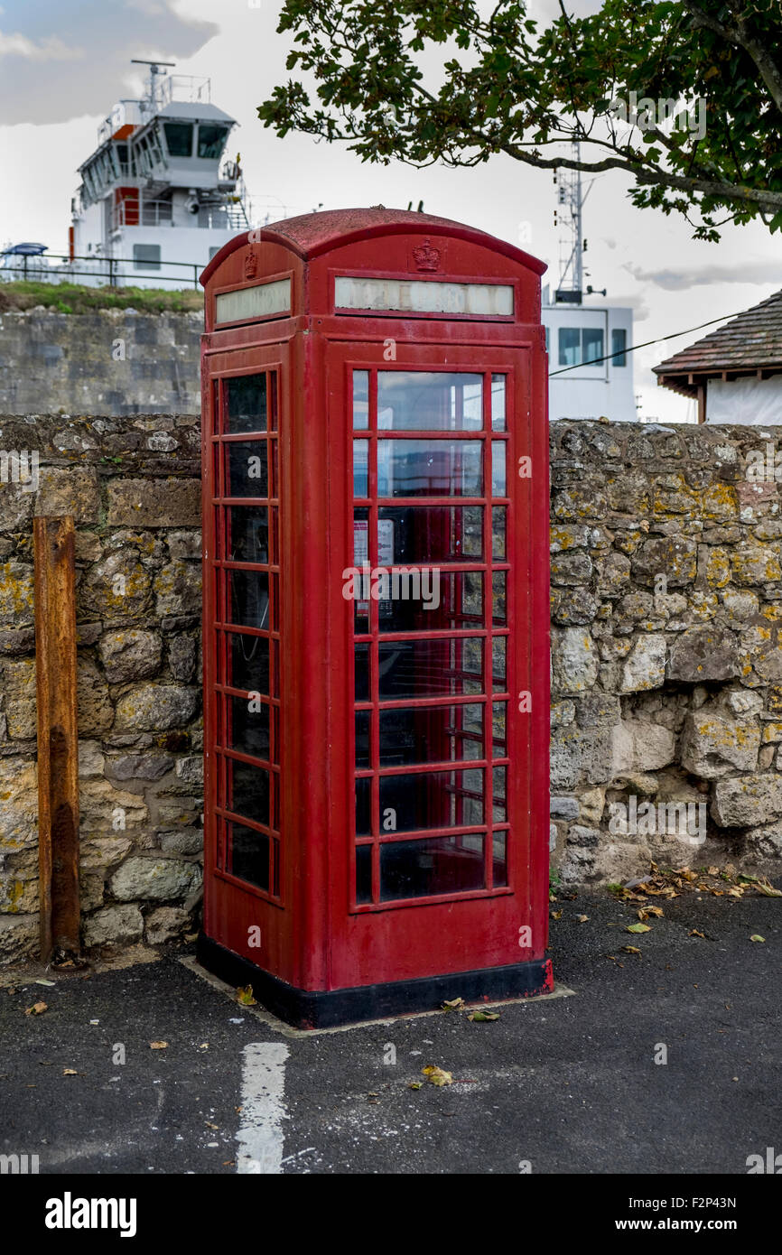 A Red old fashioned English telephone box Stock Photo - Alamy