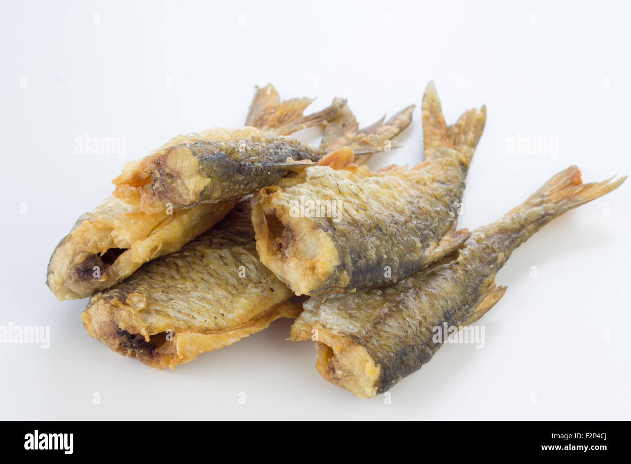 Deep fried roach fish isolated on white Stock Photo - Alamy