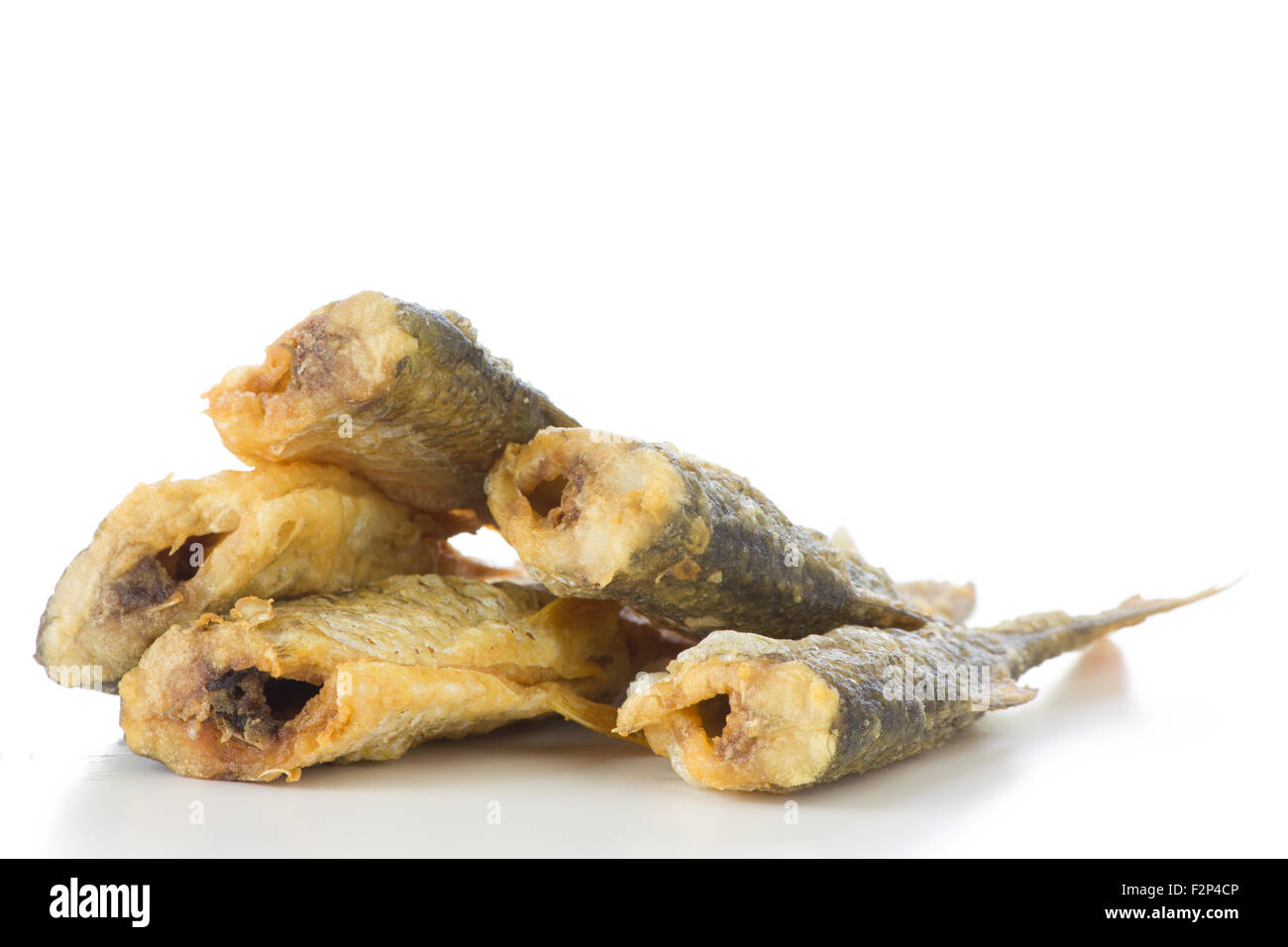 Deep fried roach fish isolated on white Stock Photo - Alamy