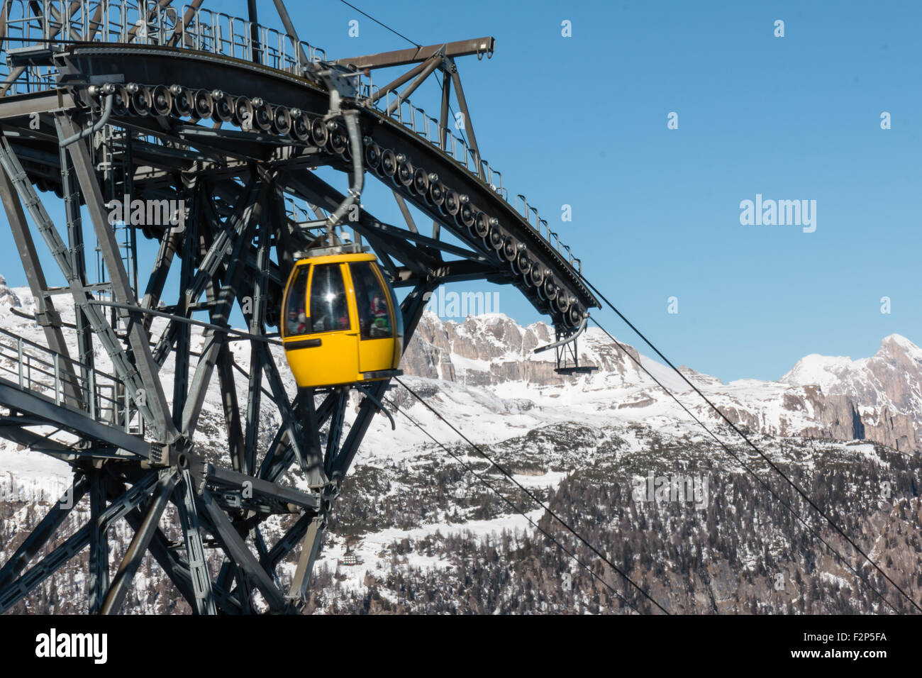 yellow cable car ski lift going up on the mountain top Stock Photo - Alamy