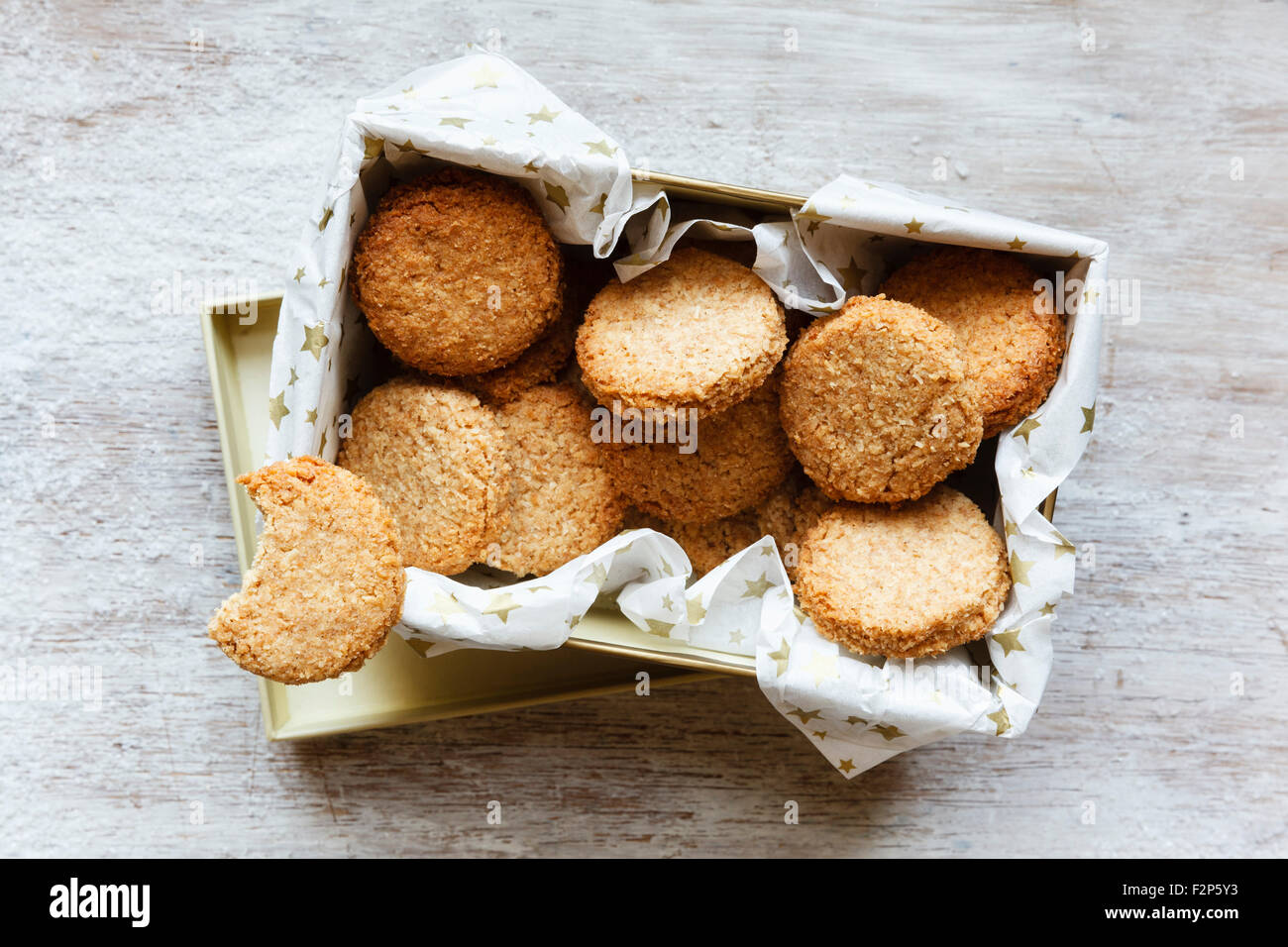 Box of whole grain cocos cookies on wood Stock Photo - Alamy