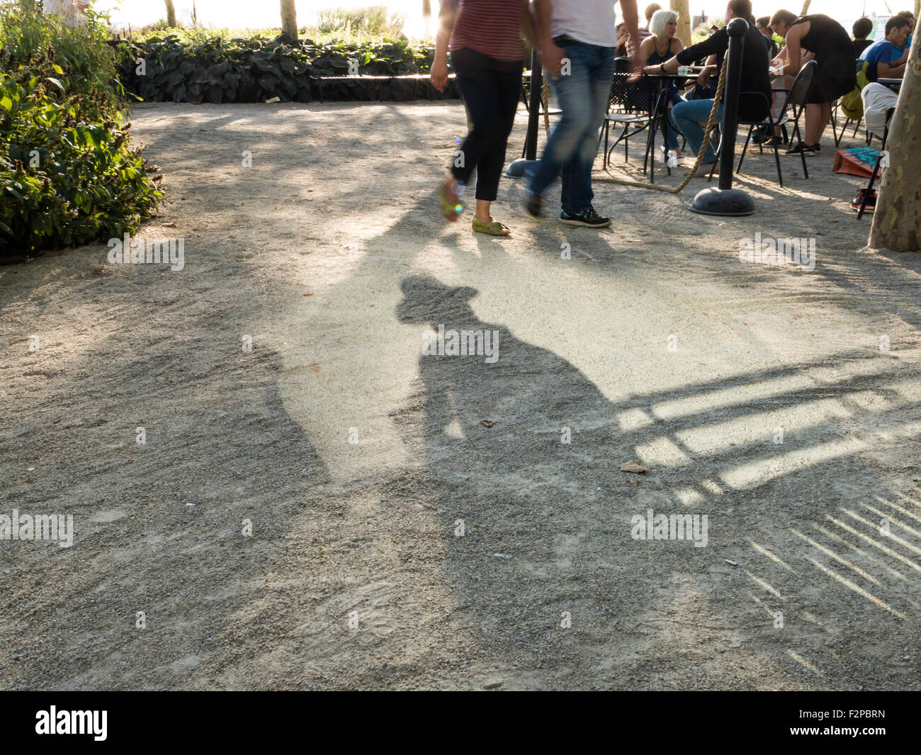 Shadow Outline of Man with Wide Brimmed Hat, Battery Park, NYC, USA ...