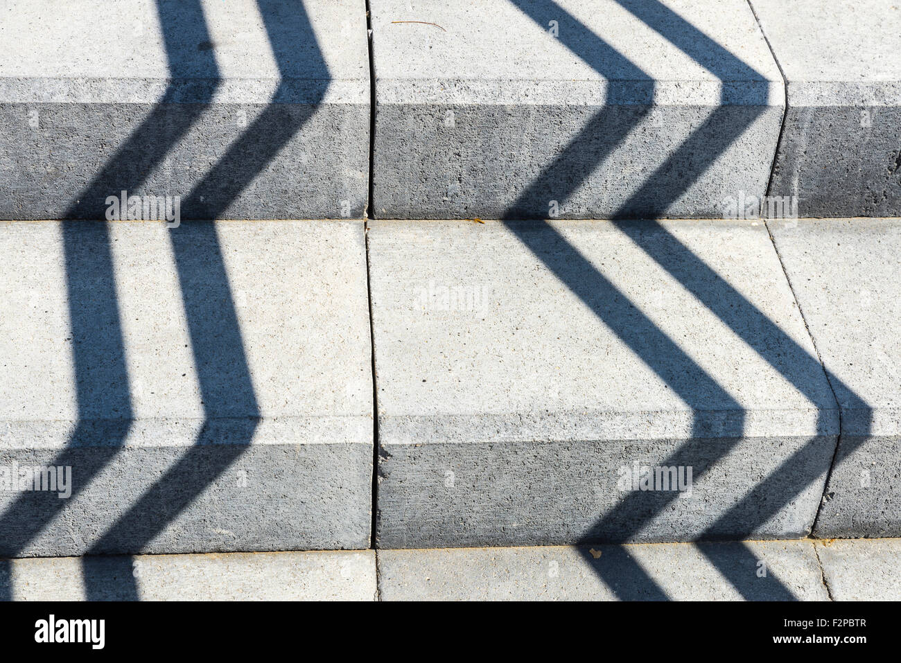 Shadows in straight lines on a gray stone staircase Stock Photo - Alamy