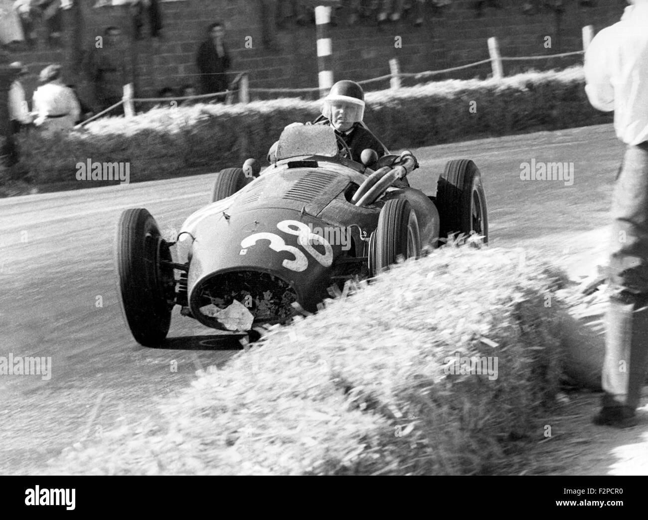 Mike Hawthorn in a Ferrari Squalo 555 in the Spanish GP in Pedralbes ...