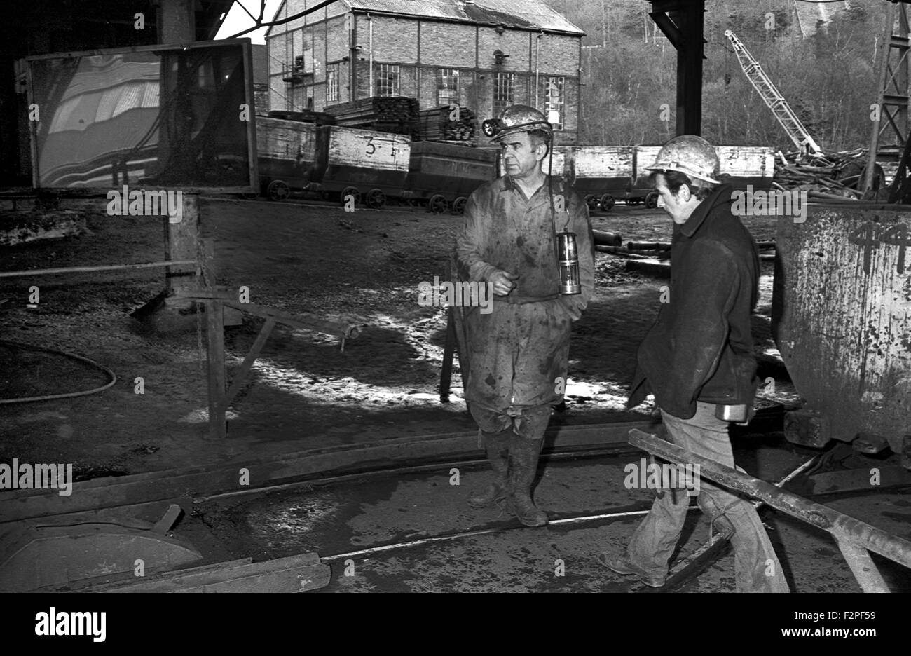 Miners emerging in the cage after completing a shift on the coal face ...