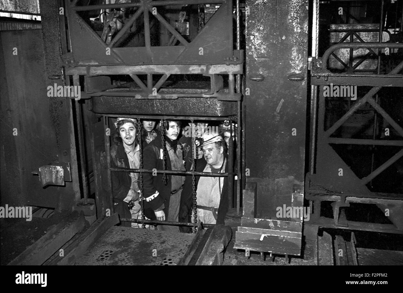Miners emerging in the cage after completing a shift on the coal face ...