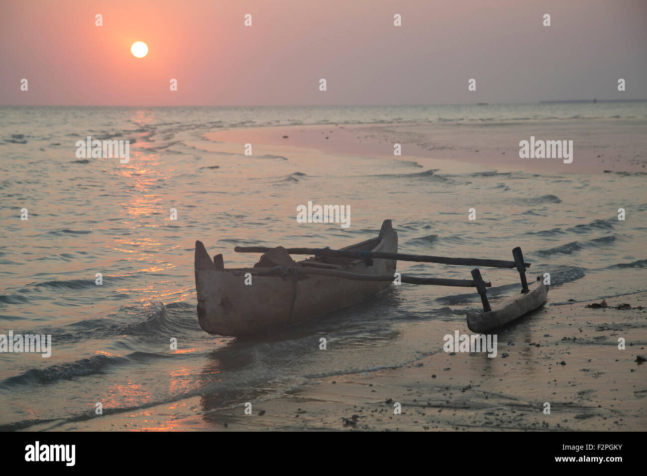 Africa, Madagascar, Pirogue boat at sunset Stock Photo - Alamy