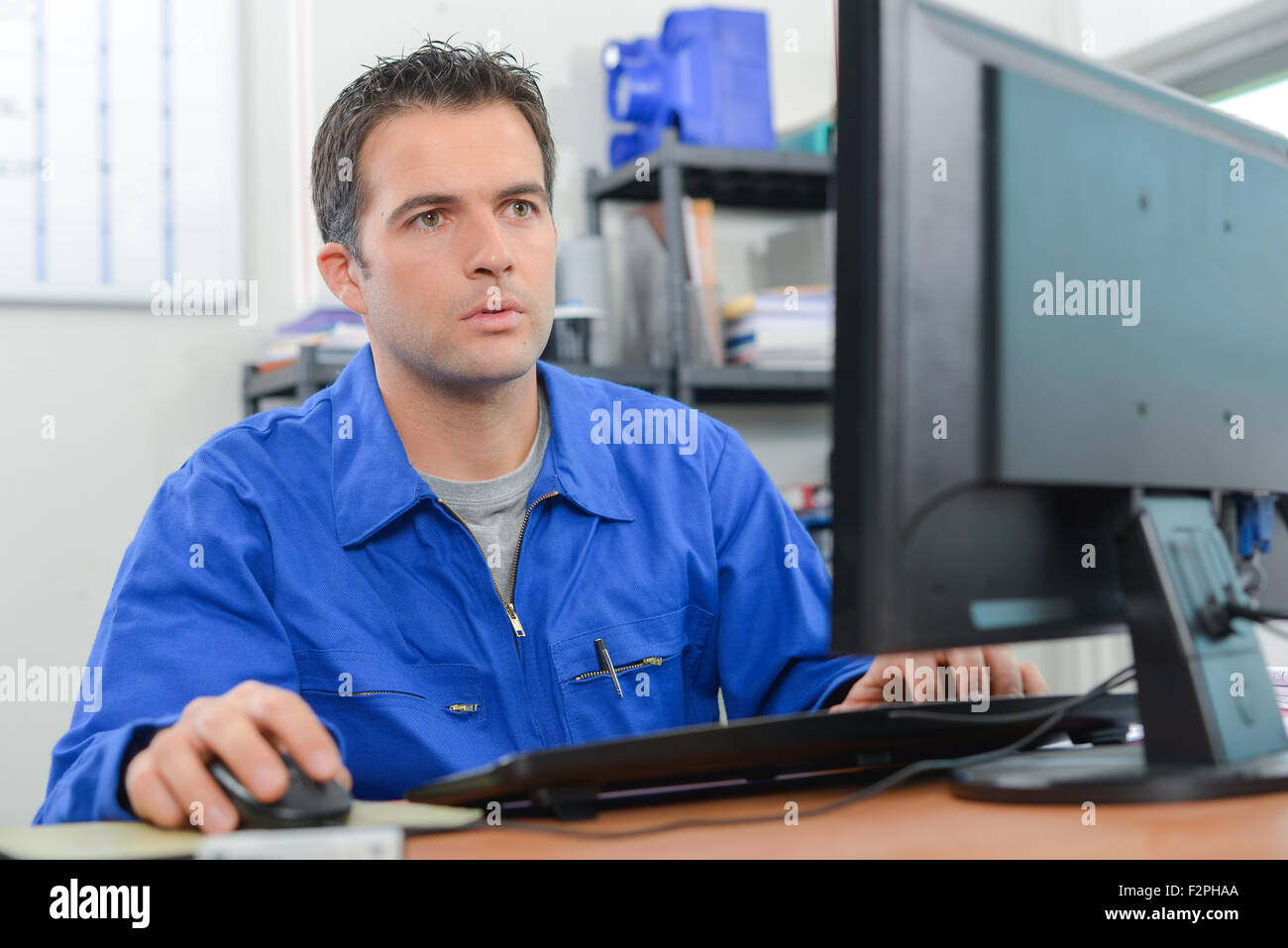 Builder at his desk Stock Photo - Alamy