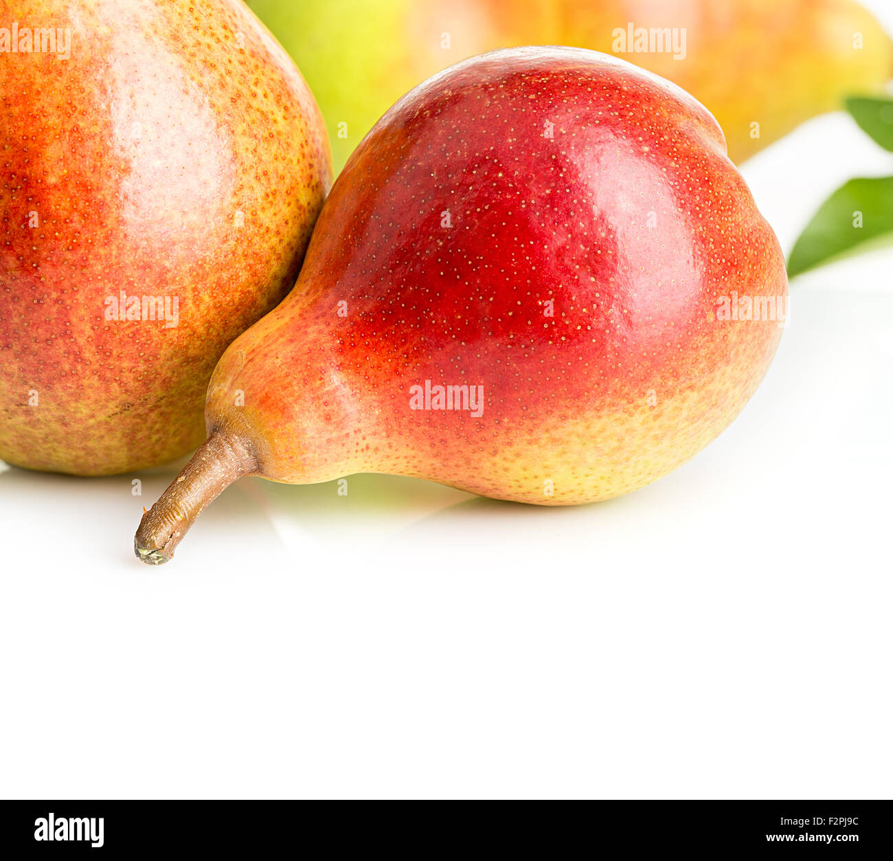 Ripe pears close-up isolated on a white background Stock Photo - Alamy