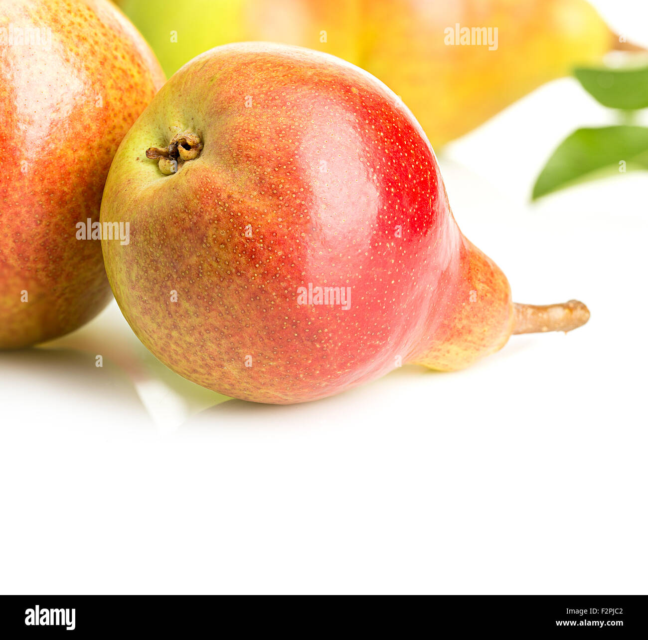 Ripe pears close-up isolated on a white background Stock Photo - Alamy