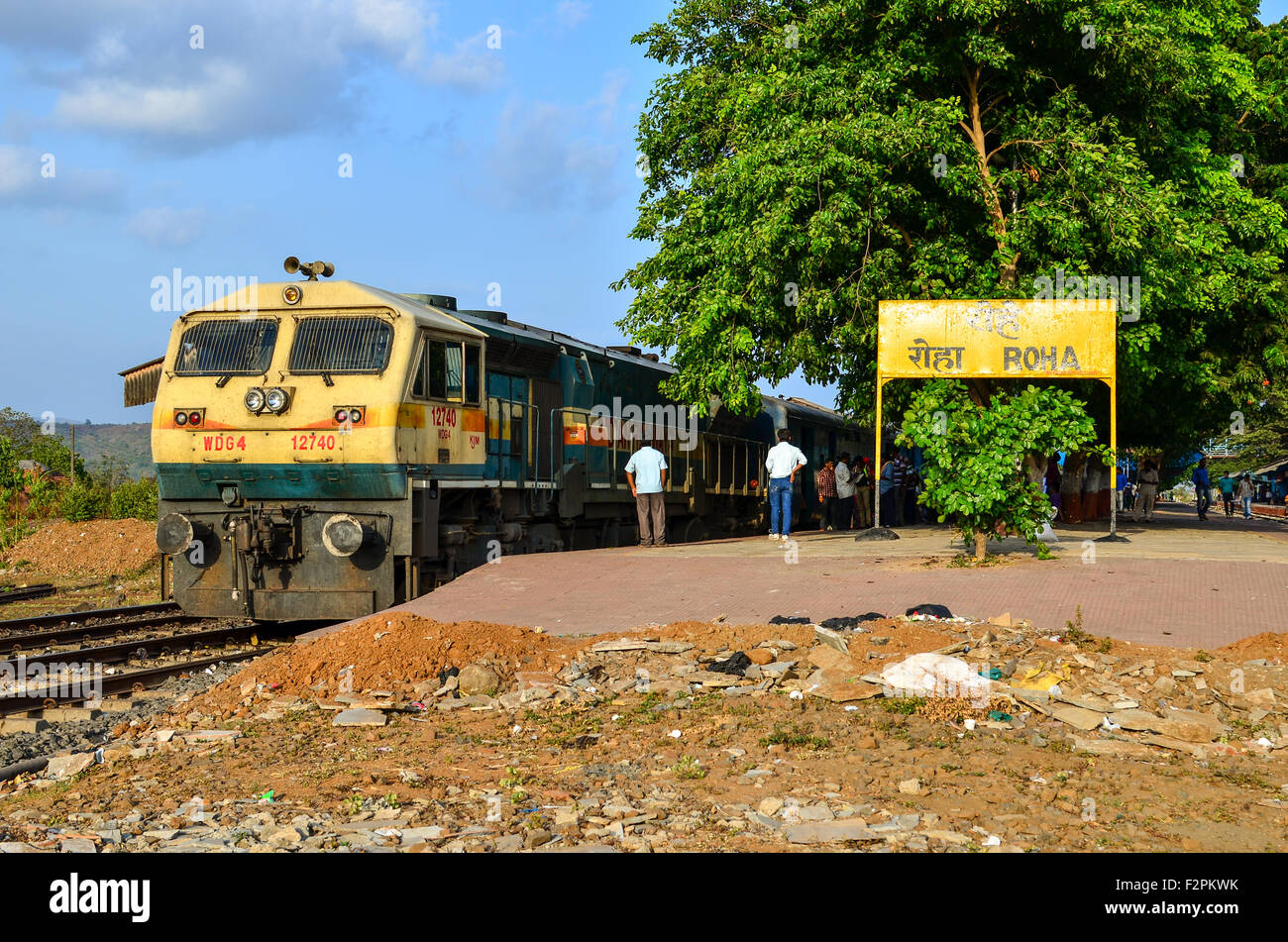 10104 Madgaon - Mumbai CST Mandovi Express waiting at the beautiful scenic Roha railway station ...
