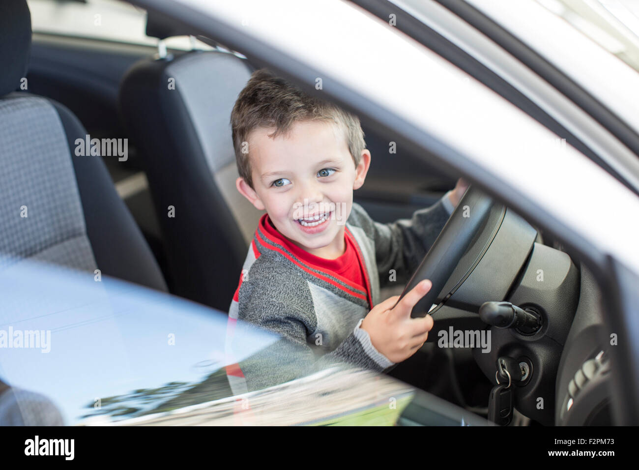 Boy inside car hi-res stock photography and images - Alamy