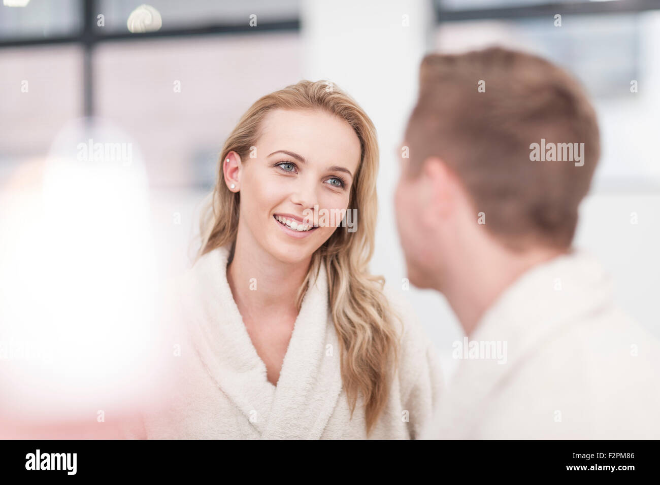 Two people communicating in a spa Stock Photo - Alamy