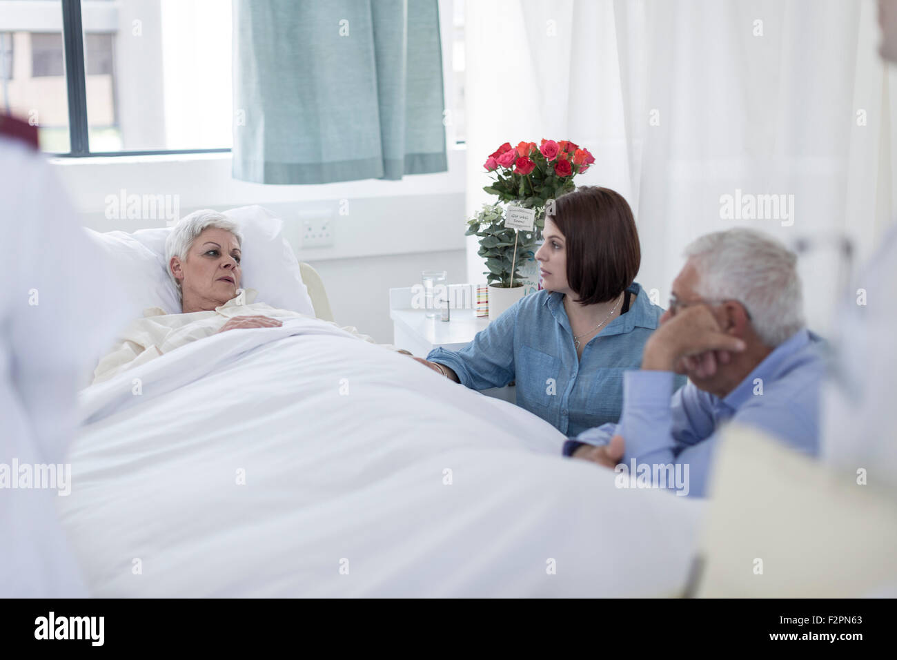 Family visiting senior patient in hospital Stock Photo - Alamy