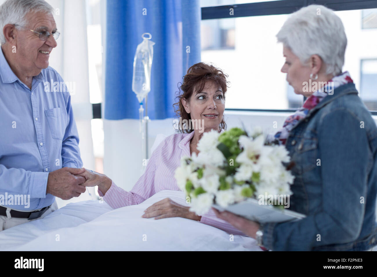 Visiting friend in hospital hi-res stock photography and images - Alamy