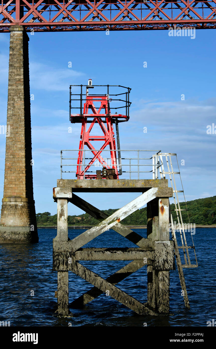 A navigation beacon near the Forth (railway) Bridge across the Firth of ...