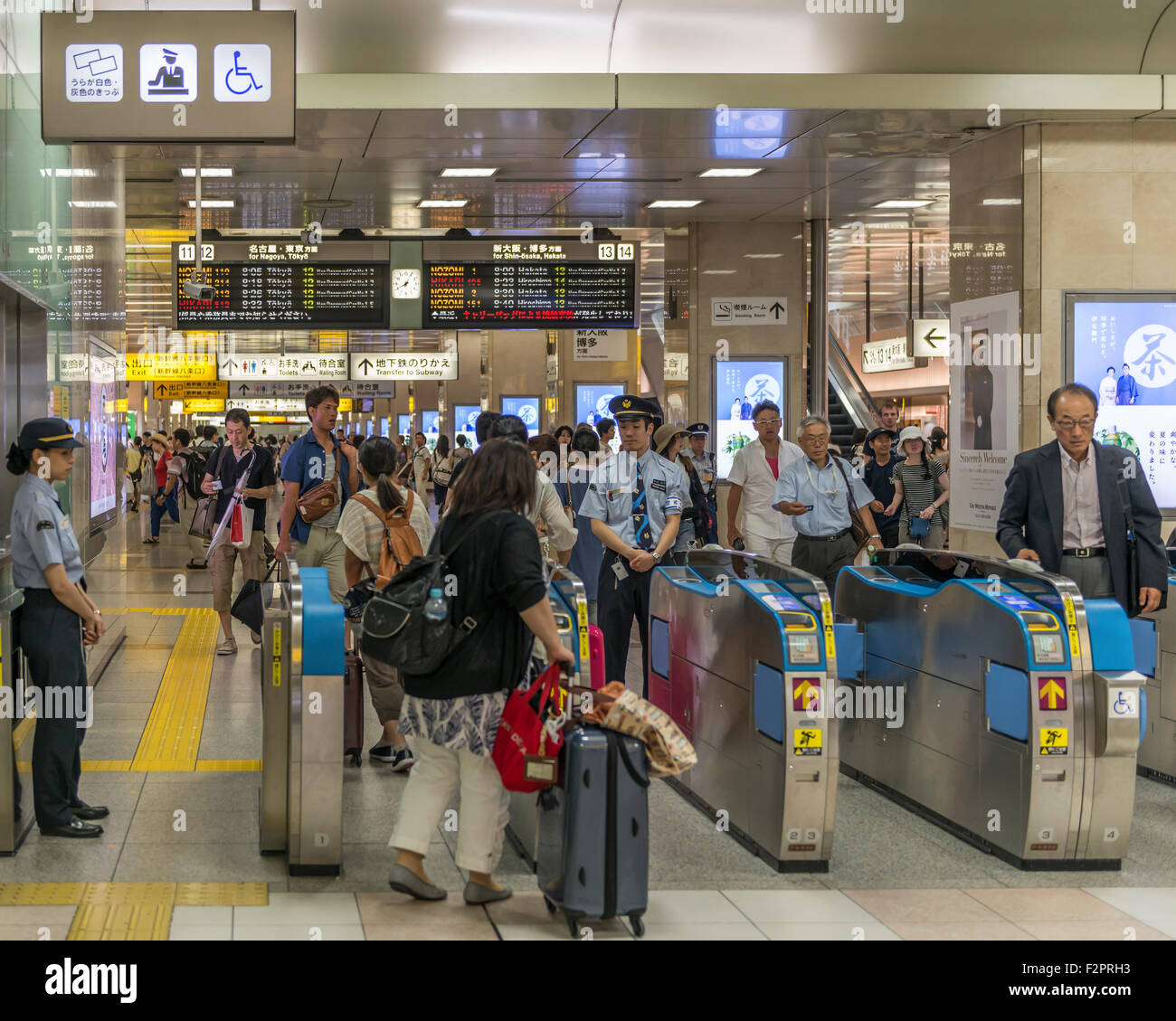 Commuters exiting train pass hi-res stock photography and images - Alamy