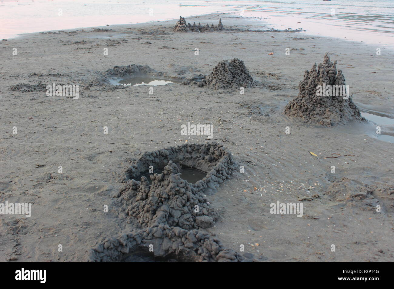 built sand figure on the beach Stock Photo - Alamy
