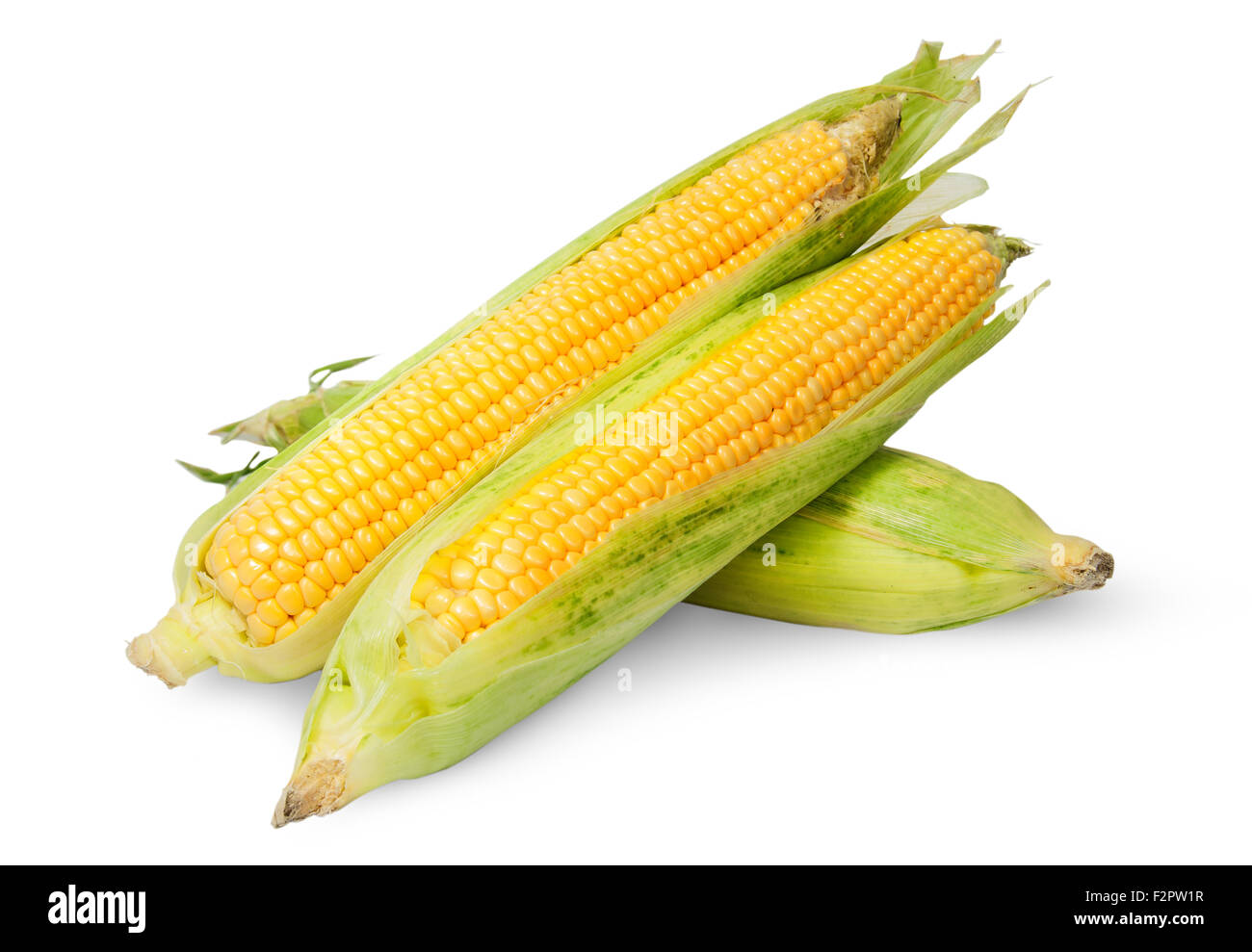 Three corn cob lying cross isolated on white background Stock Photo - Alamy