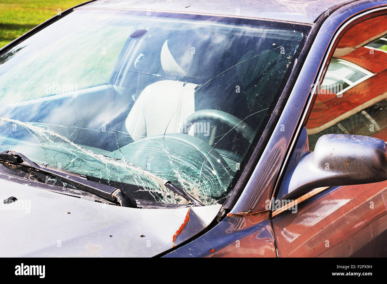 Broken glass of a passenger car after crash Stock Photo - Alamy