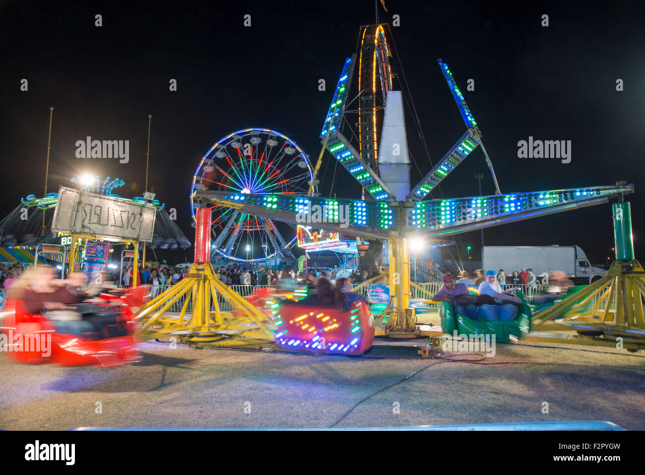 Hutchinson, Kansas. 9-18-2015 The midway carnival amusement rides at ...