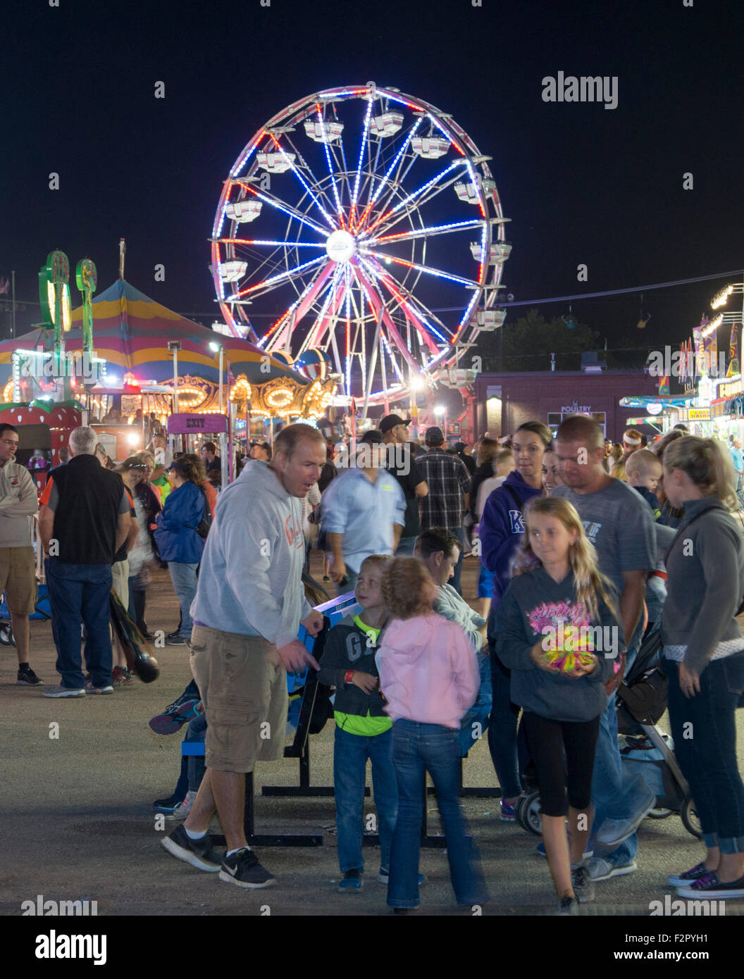 Hutchinson, Kansas. 9-18-2015 The midway carnival amusement rides at ...
