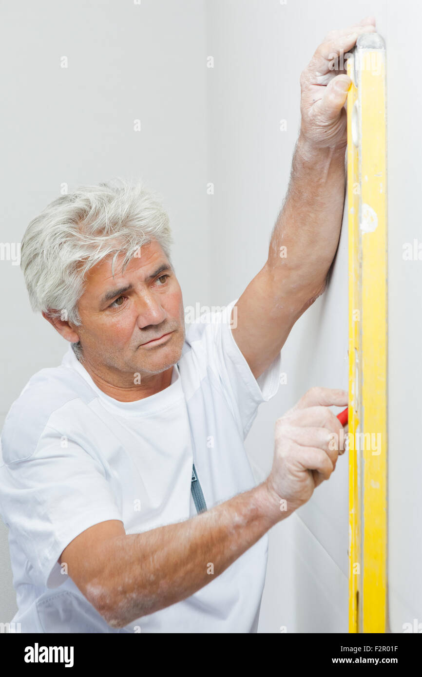 Make sure the wall is straight Stock Photo - Alamy