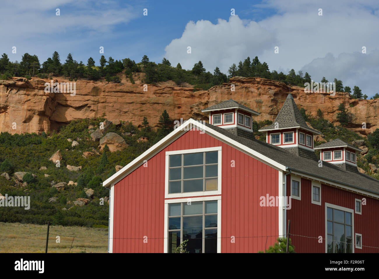 A red barn in front of the front range cliffs, Palmer Lake CO Stock ...