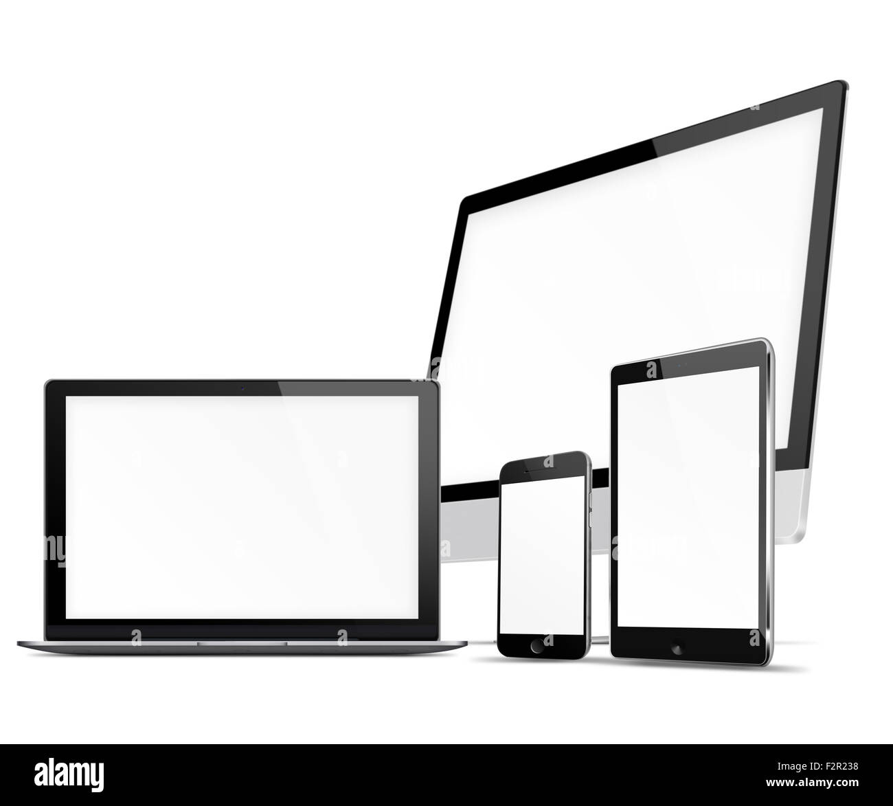 Computer monitor, mobile phone, laptop and tablet pc with blank screen ...