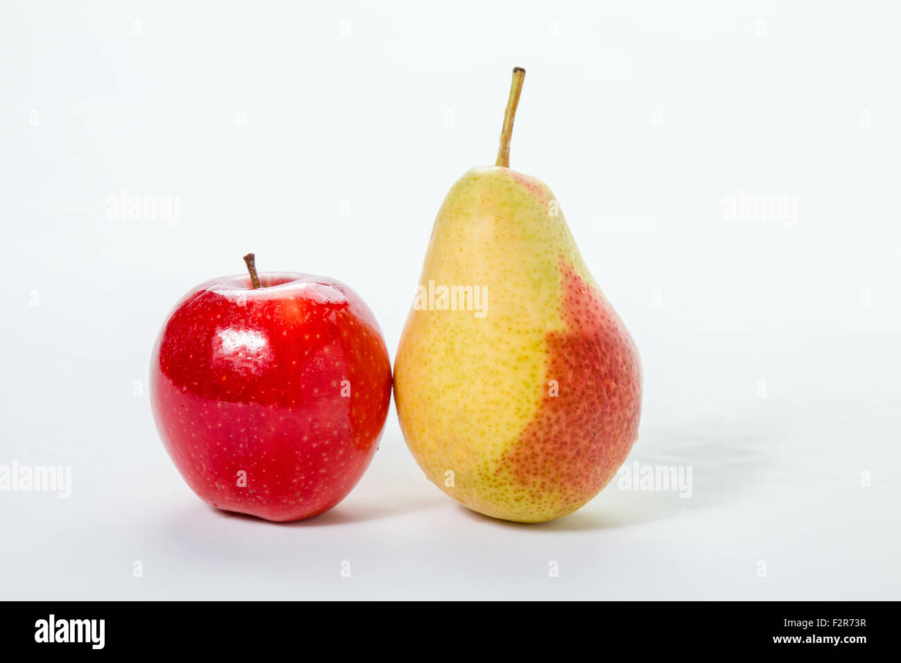 Apple and pear isolated on white background Stock Photo - Alamy