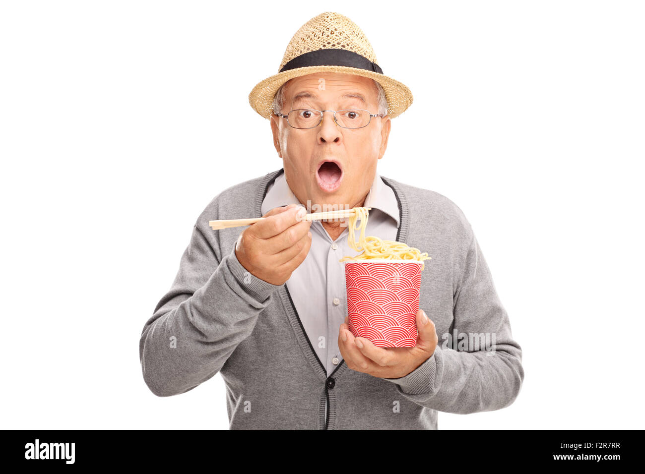 Man eating chinese food watching hi-res stock photography and images ...