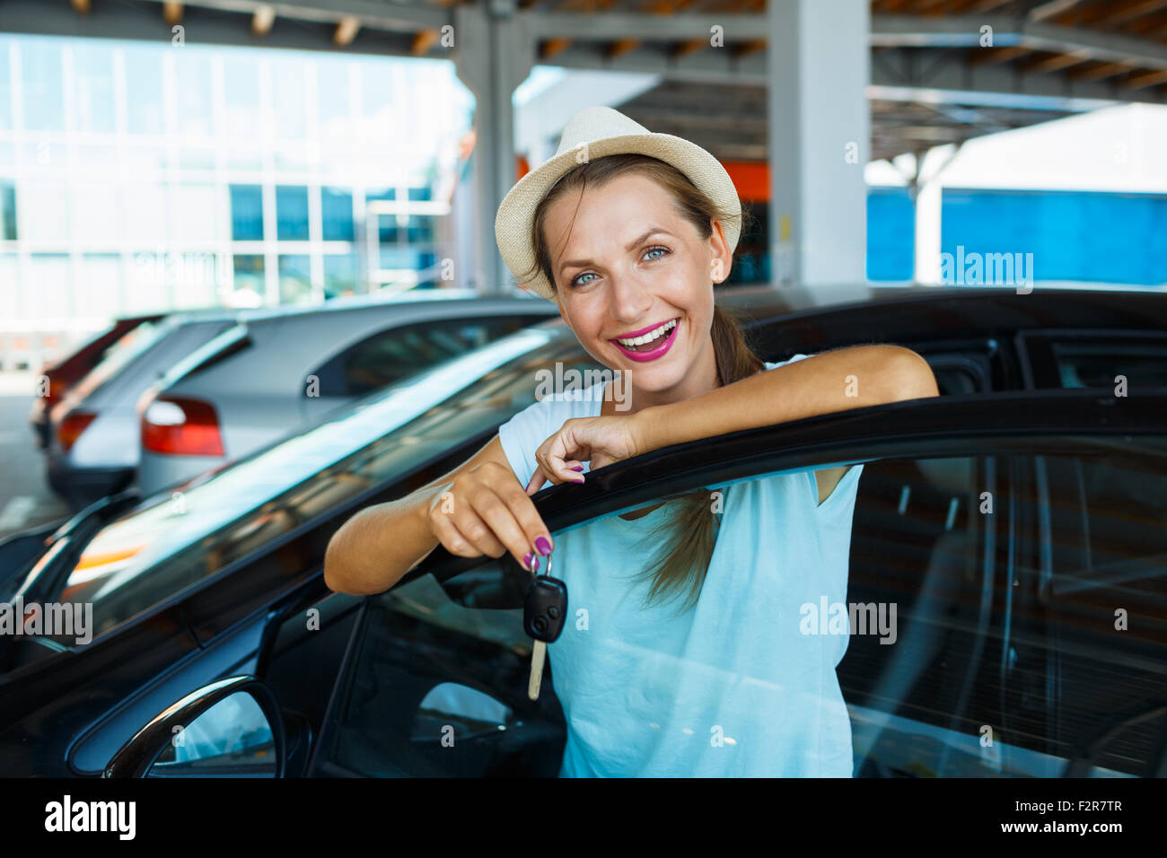 Happy girl keys hi-res stock photography and images - Alamy