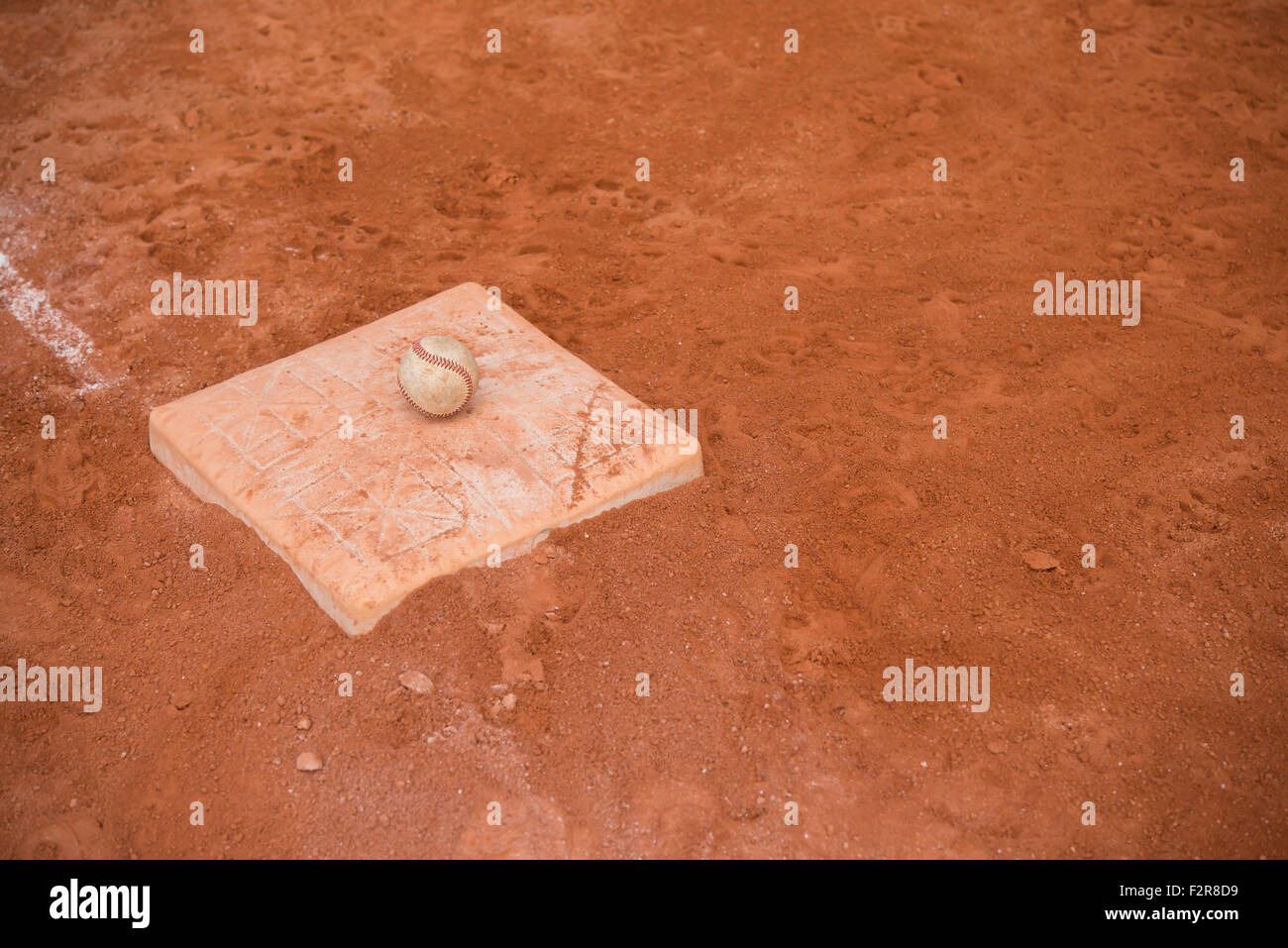 baseball and base on baseball field Stock Photo - Alamy