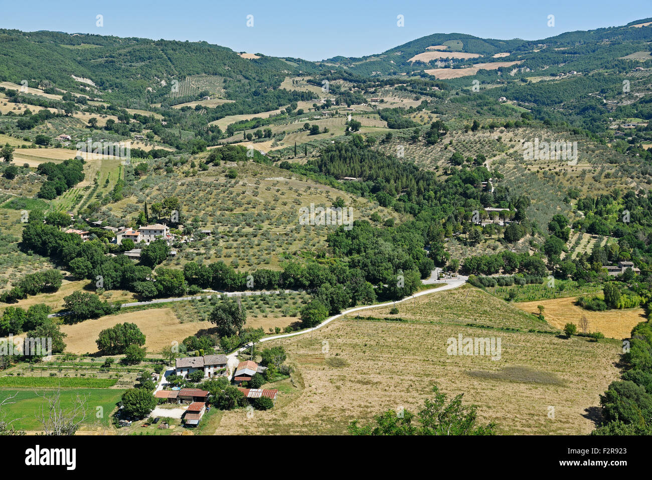 Landscape with a small village near Assisi, Province of Perugia, Umbria ...