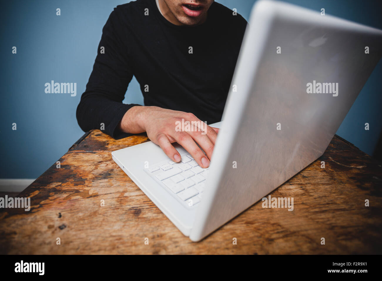 Asian guy using internet computer hi-res stock photography and images ...