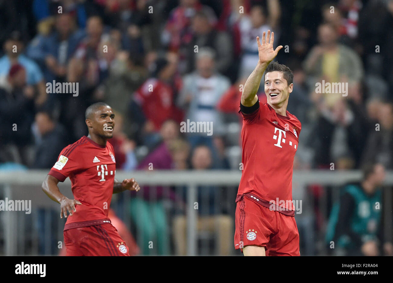 Munich, Germany. 22nd Sep, 2015. Munich's Robert Lewandowski (r) holds ...