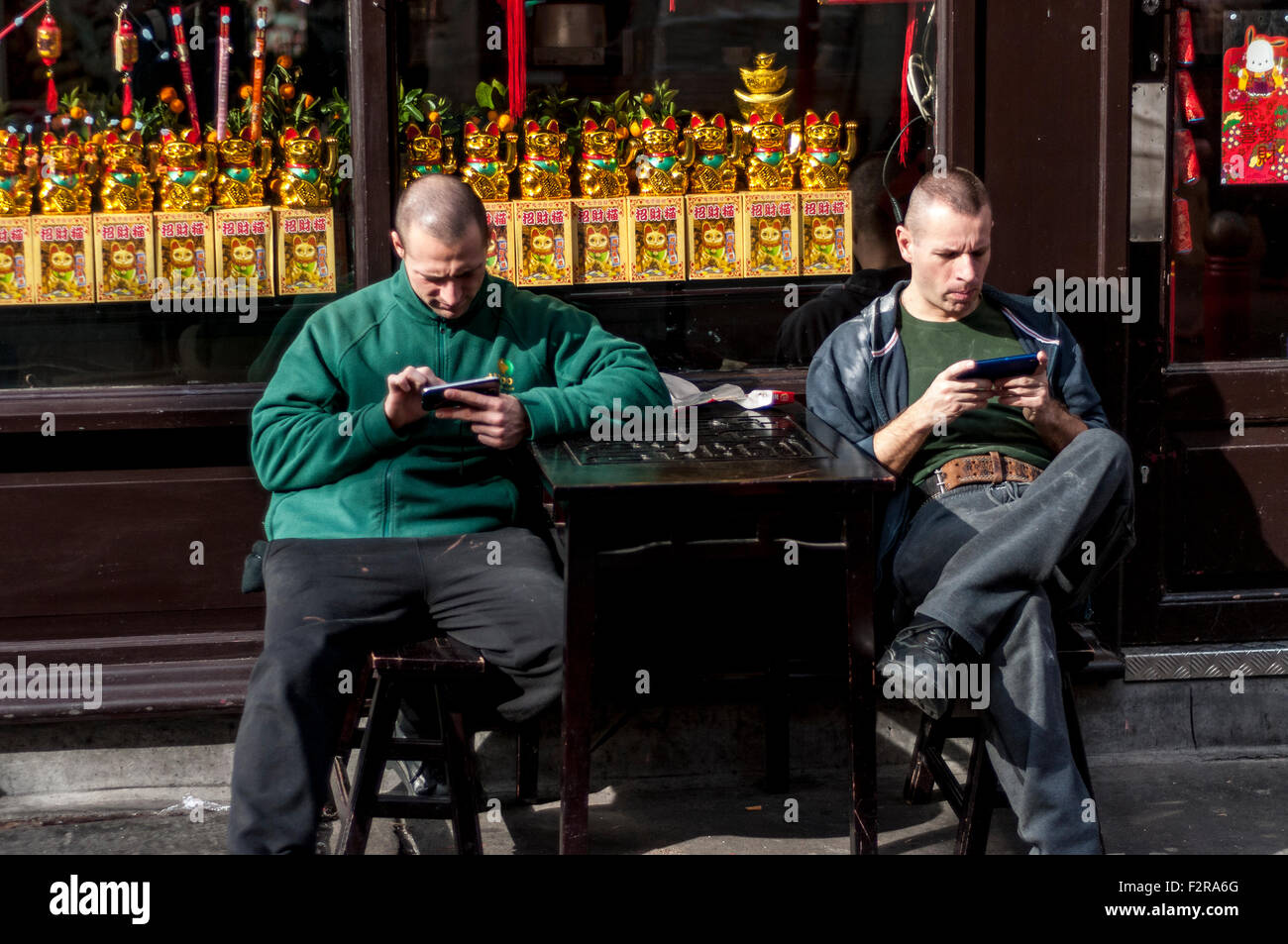 Using two phones hi-res stock photography and images - Alamy