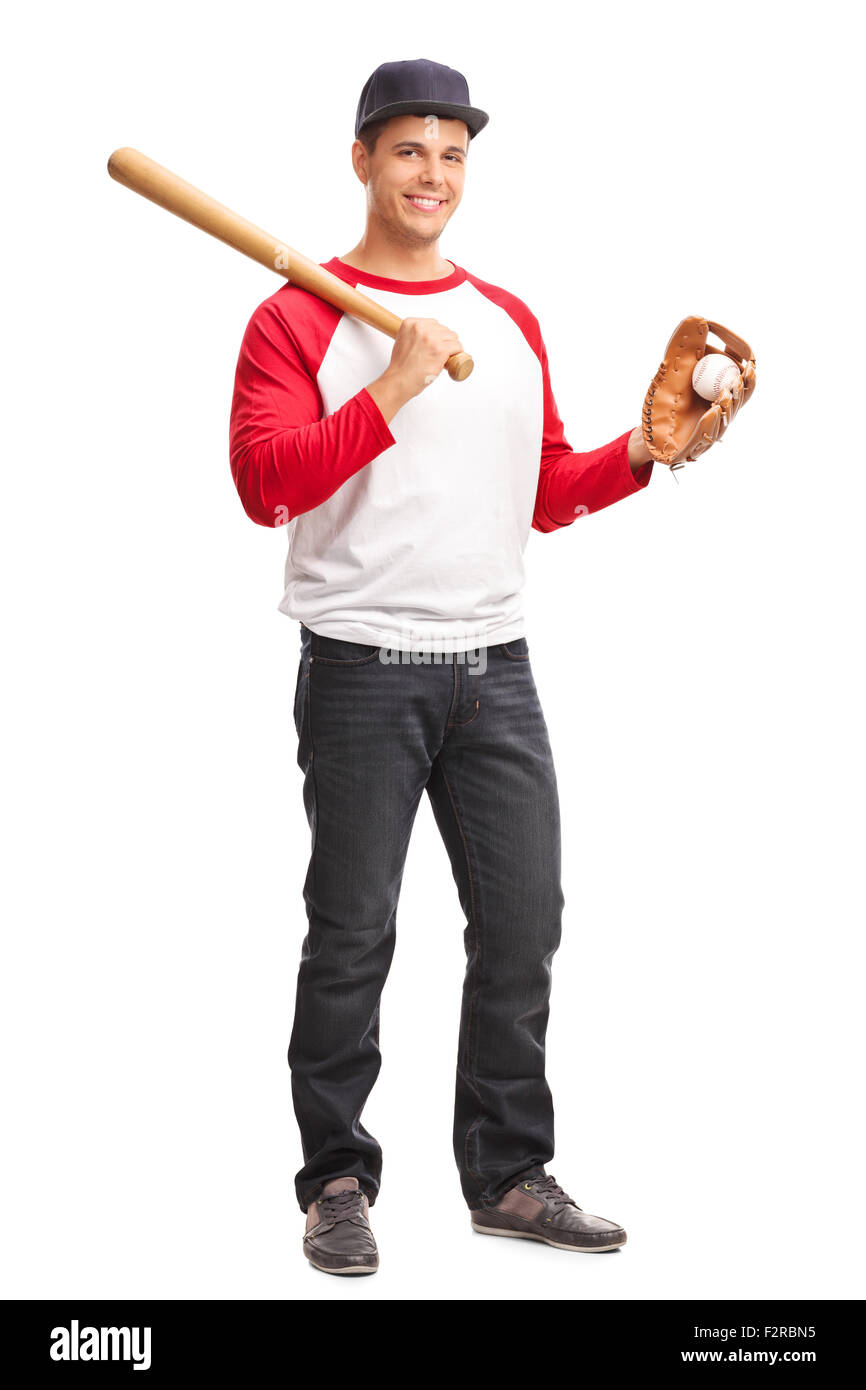 Full length portrait of a young man holding a baseball bat and looking ...