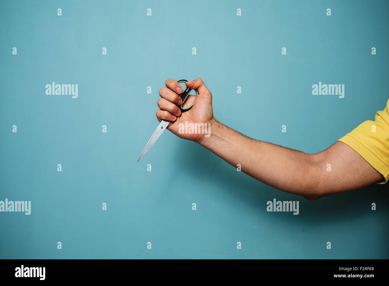 Hand holding pair scissors hi-res stock photography and images - Alamy