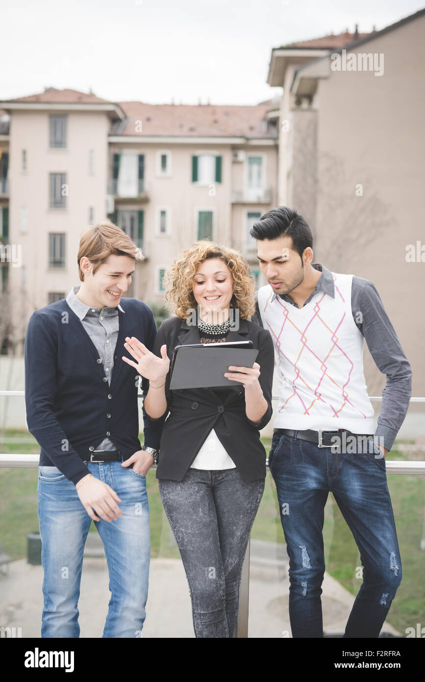 Multiracial contemporary business people working outdoor in town ...