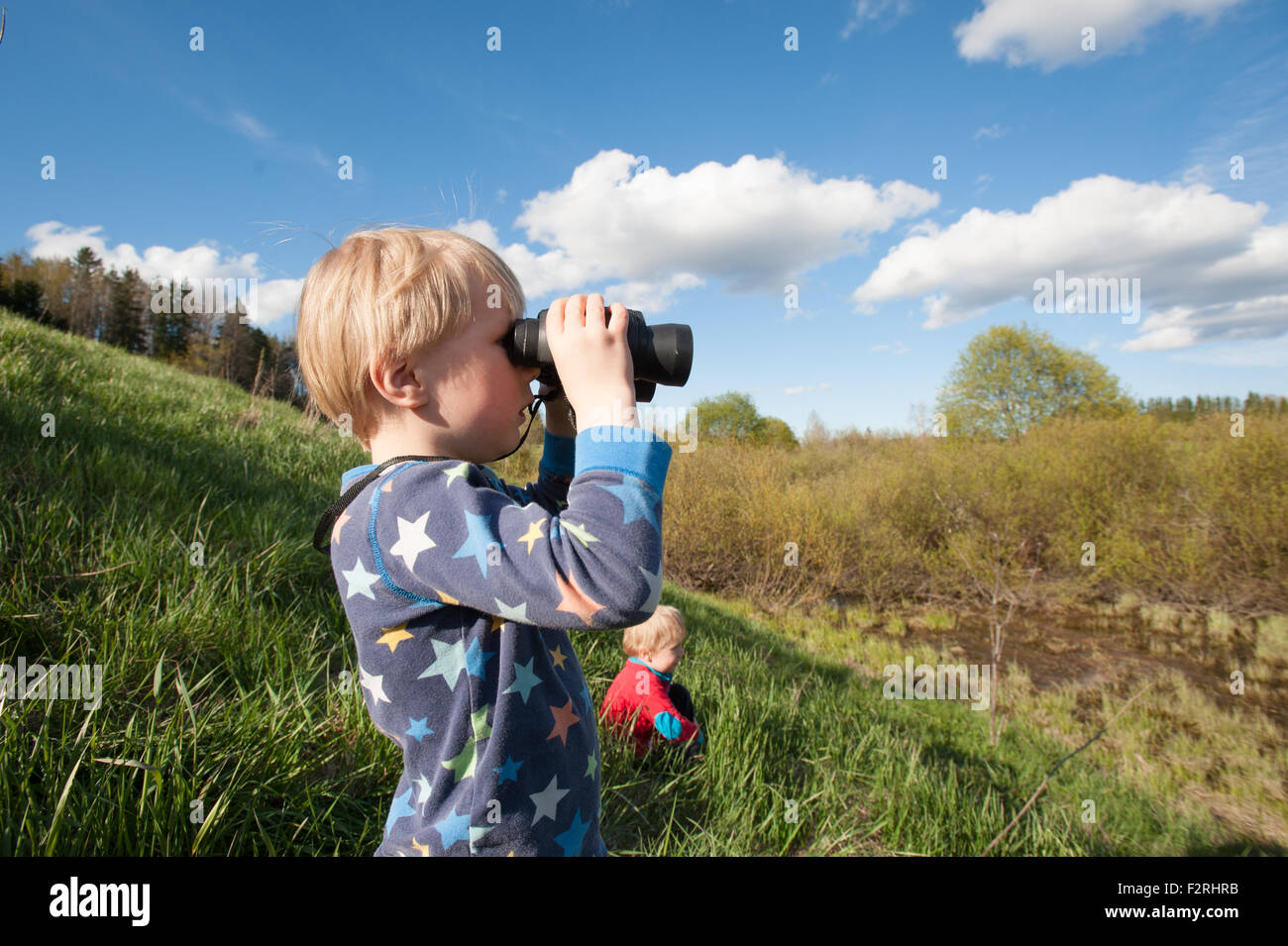 Little boys with binoculars Stock Photo - Alamy