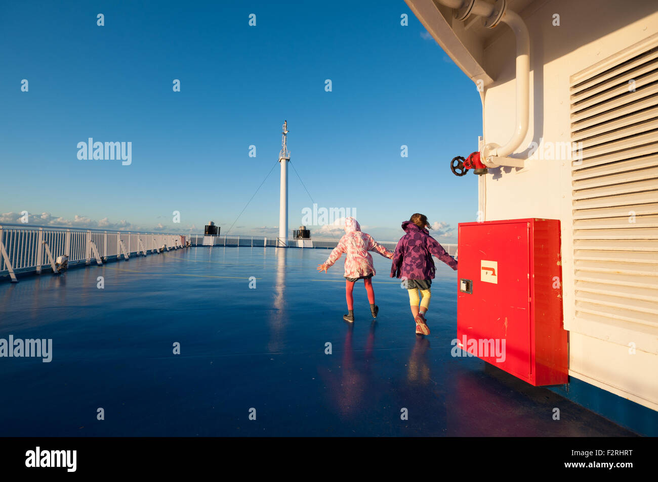 Kids on ship deck Stock Photo - Alamy
